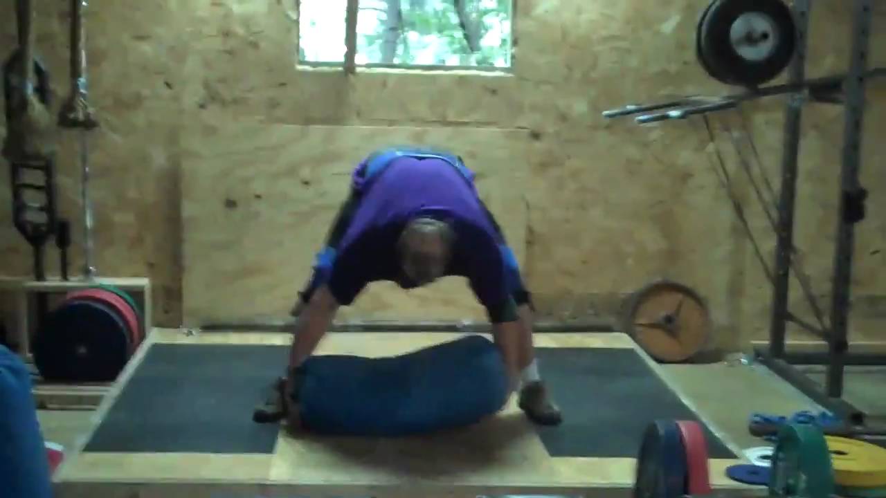 Dave Ostlund vs 304 pound Sandbag - YouTube