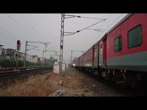 SPJ WAP-7 #37573 with 12293 Mumbai LTT - Prayagraj AC Duronto Express skipping Madan Mahal ...