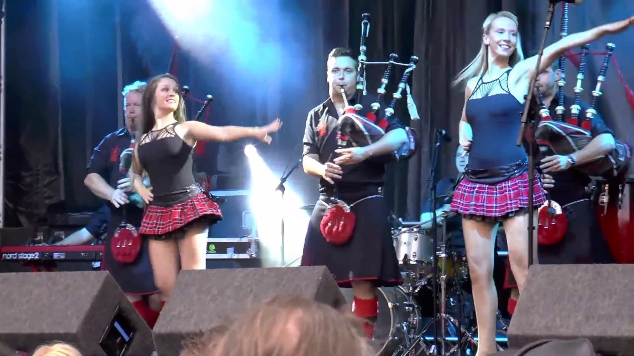 Red Hot Chilli Pipers, with dancing girls at Shrewsbury Flower Show ...