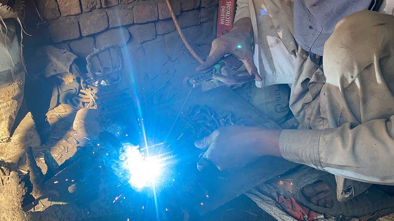 A Skillful Man Making Iron Hooks With Welding - YouTube