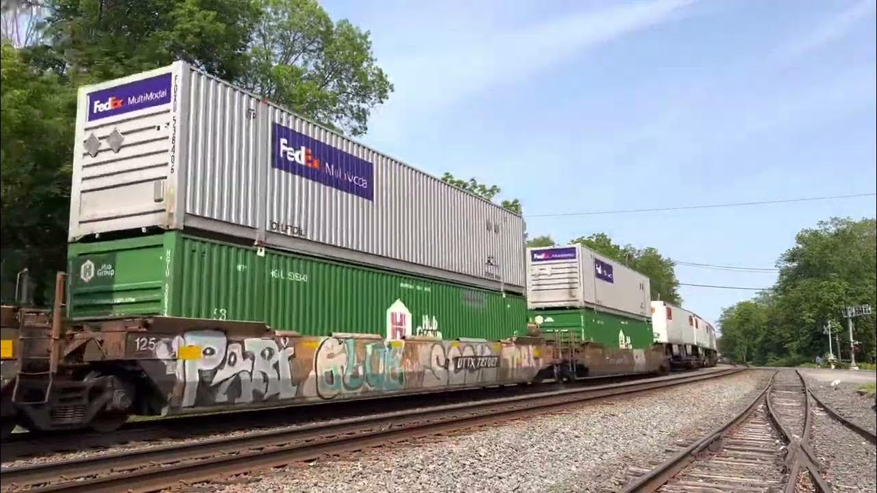 NS 1210 SD70ACe leads NS 23G through Piscataway,NJ - YouTube