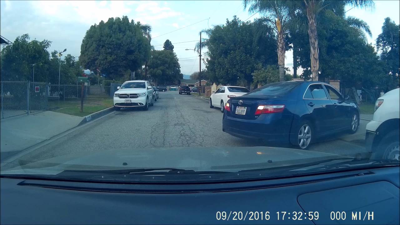 Hit by a car backing out of driveway! - YouTube