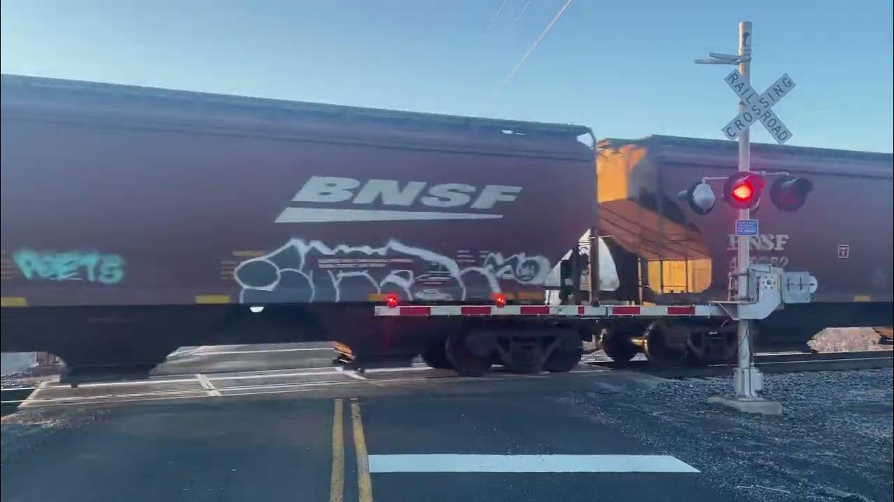 12/31/2024 BNSF 6633 westbound grainer on the fallbridge sub - YouTube