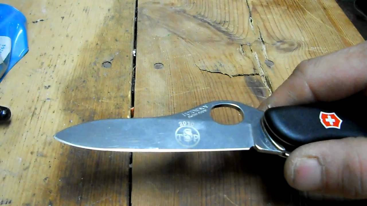 SAK one-handed trekker--TSP2010 engraved - YouTube