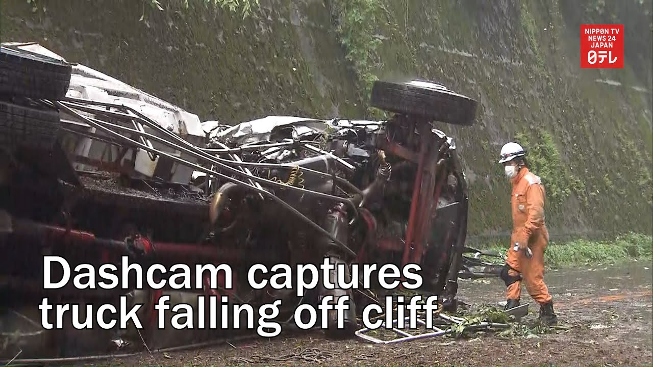 Dashcam captures truck falling off cliff - YouTube