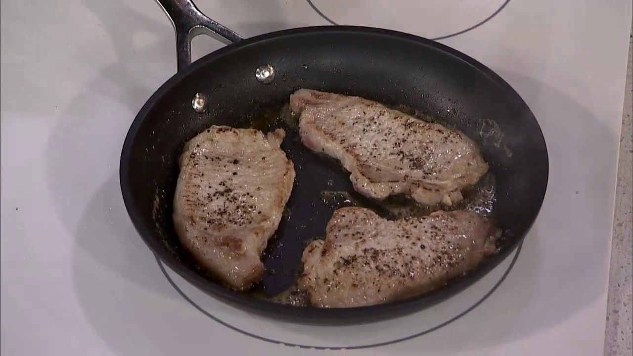 A fast-fry pork chop dish served with spring vegetables + fresh herbs ...