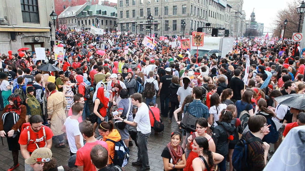 Students march to protest tuition fee hikes - YouTube