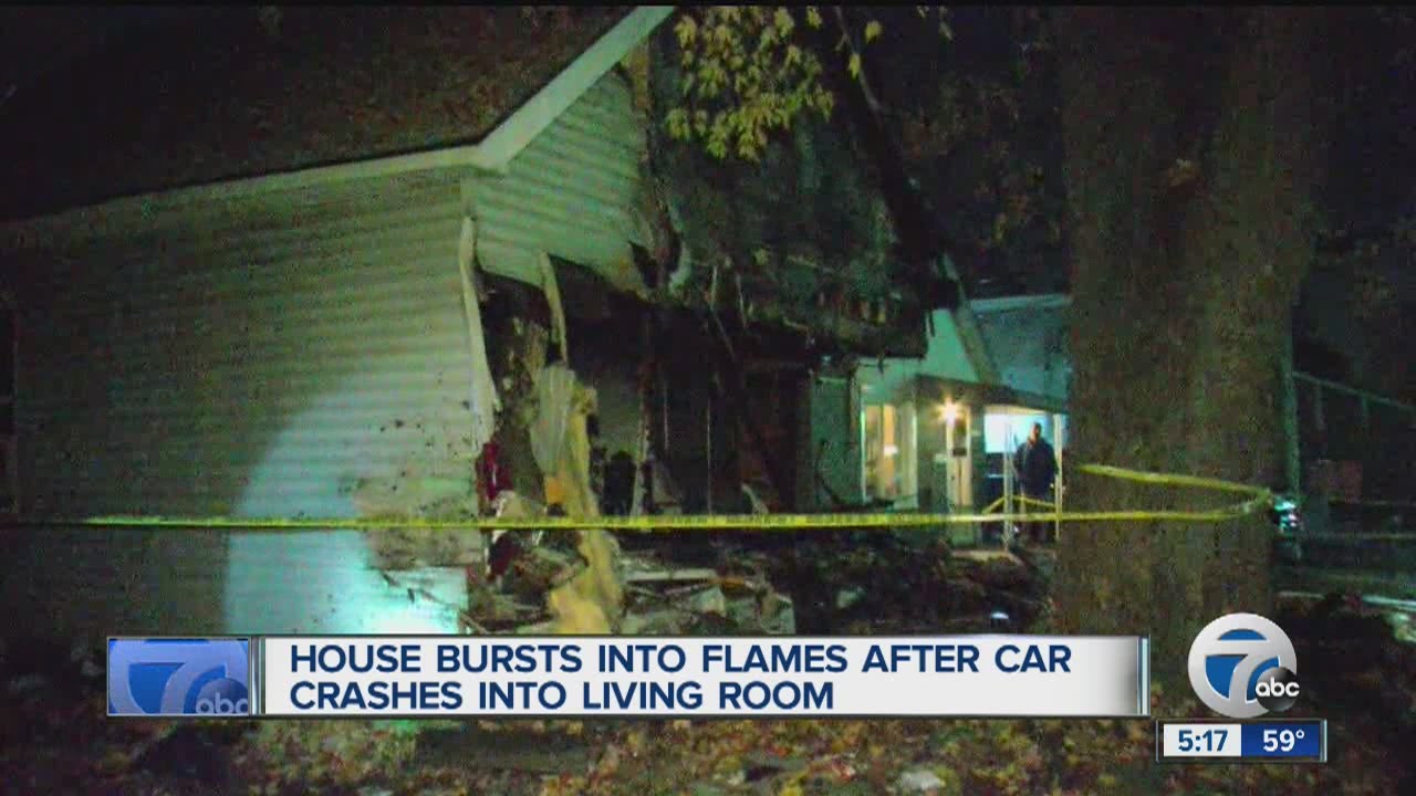 House catches fire after car crashes into home - YouTube