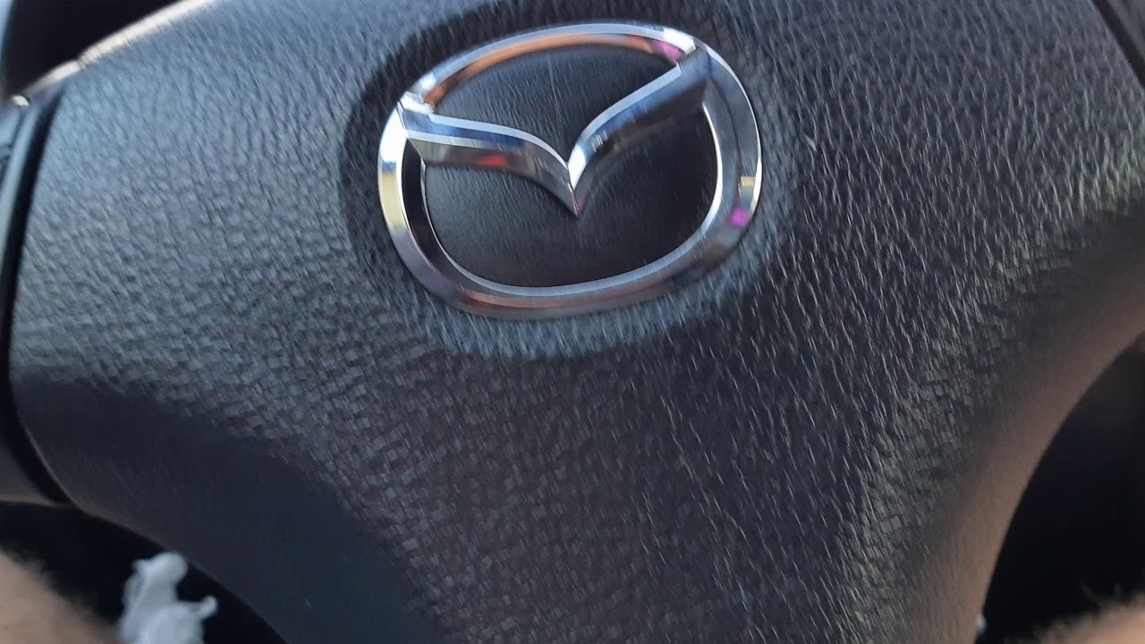 PowerBass 2xl-124D Mazda 323F BG - YouTube