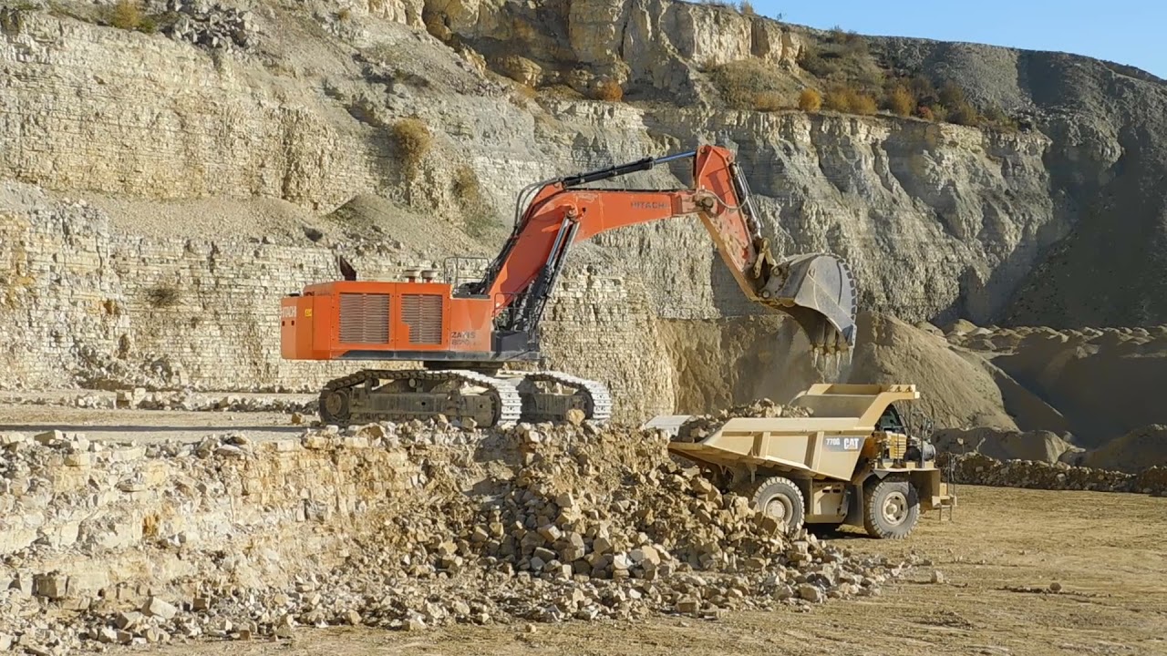 Hitachi 870 Cat 770G - YouTube