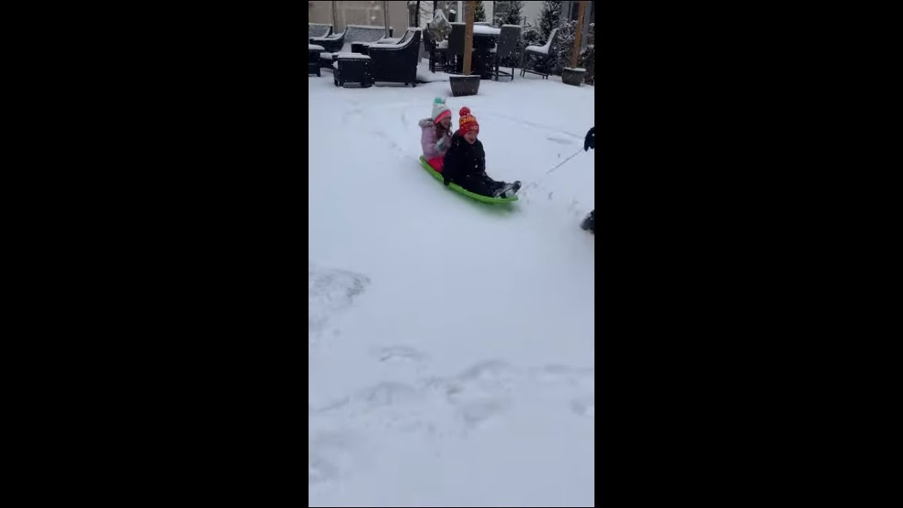 Kids Fall Off The Sled While Being Pulled By Their Dad - YouTube
