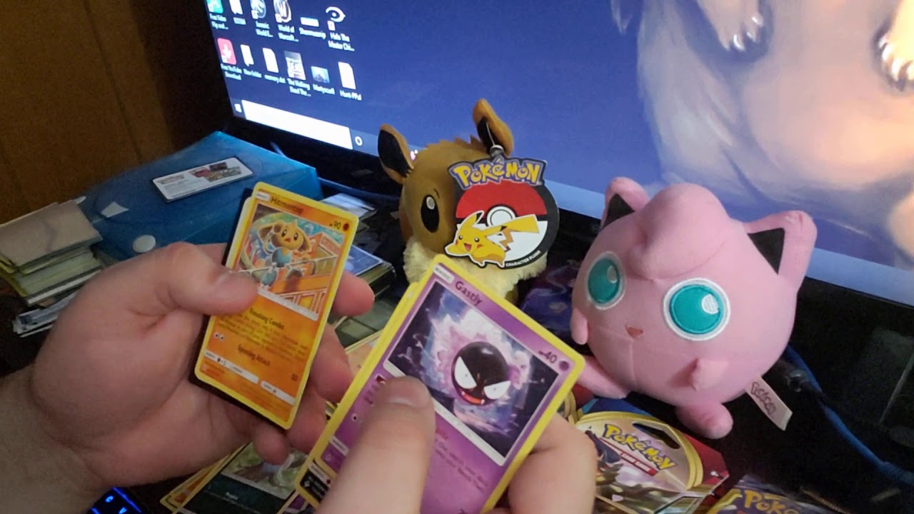 Pokemon Alolan Marowak GX box, sword and shield, and unified minds ...