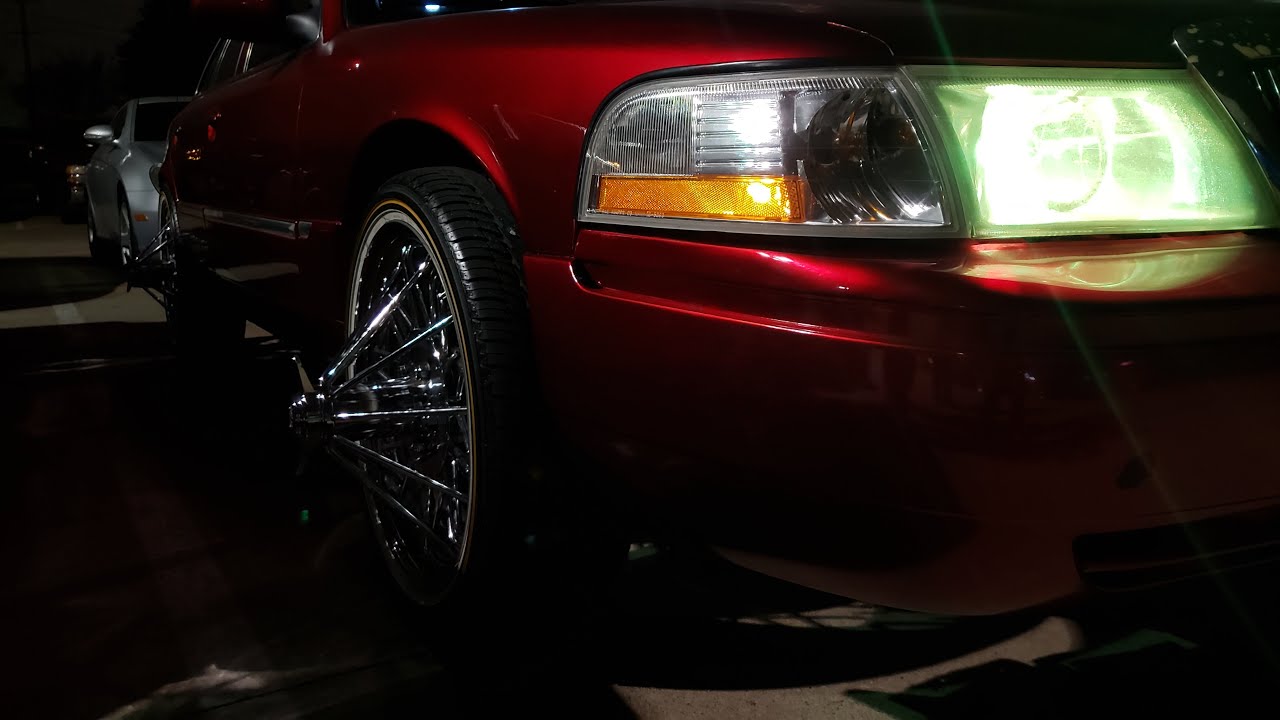 Red Mercury Grand Marquis on Texas Wire Wheels Swangas and Vogue Tires ...