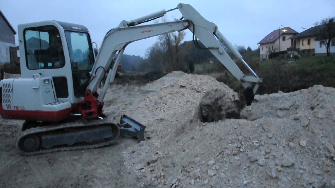 Takeuchi TB125 - YouTube