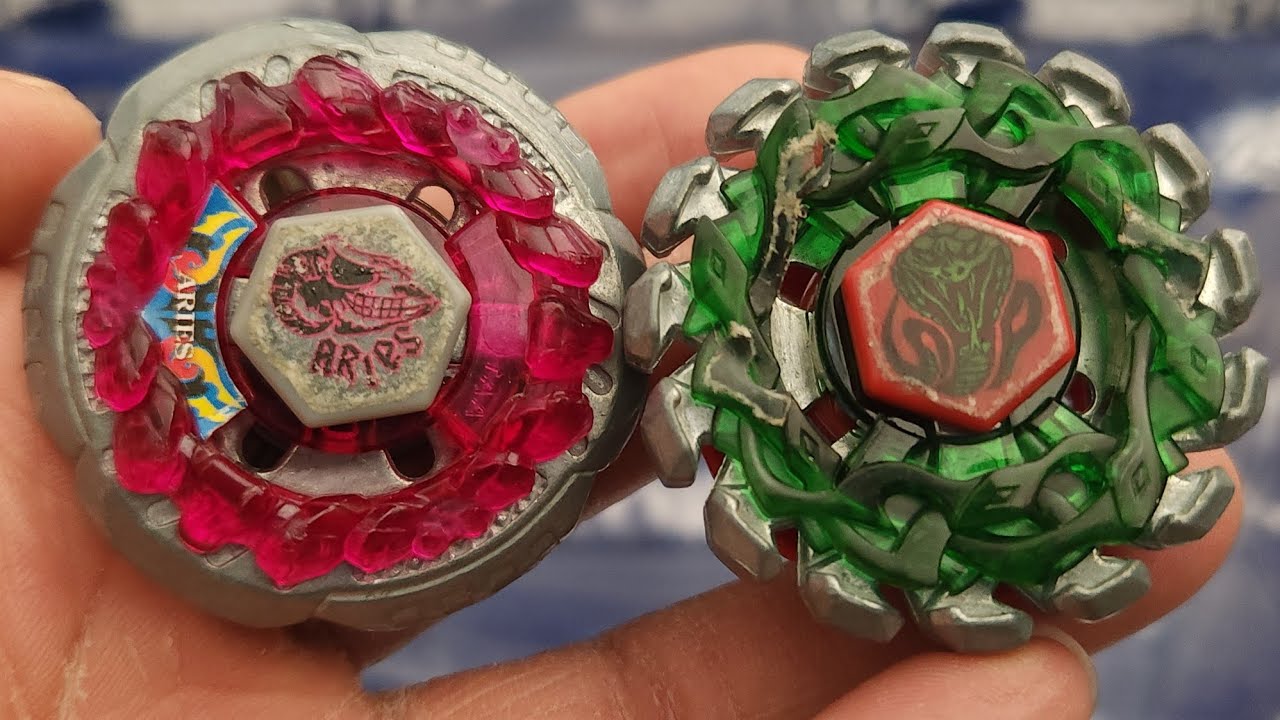 BEYBLADE METAL FIGHT - ROCK ARIES ED145B VS POSION SERPENT SW145SD ...