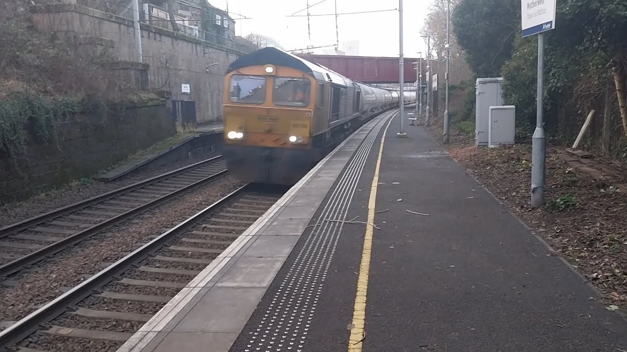 GBRf Class 66 (66748) on 4M01 passing Motherwell Platform 1. - YouTube