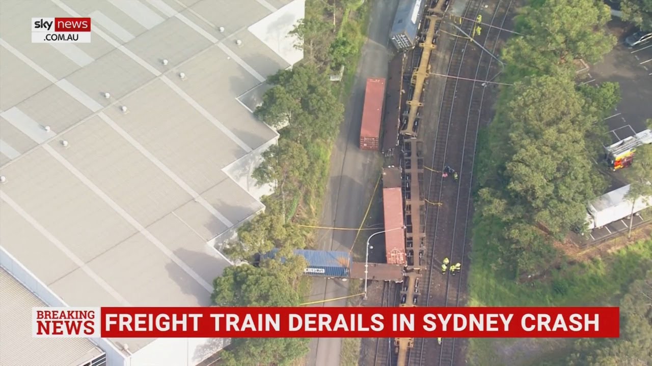 Freight train derails after collision in Sydney’s south - YouTube