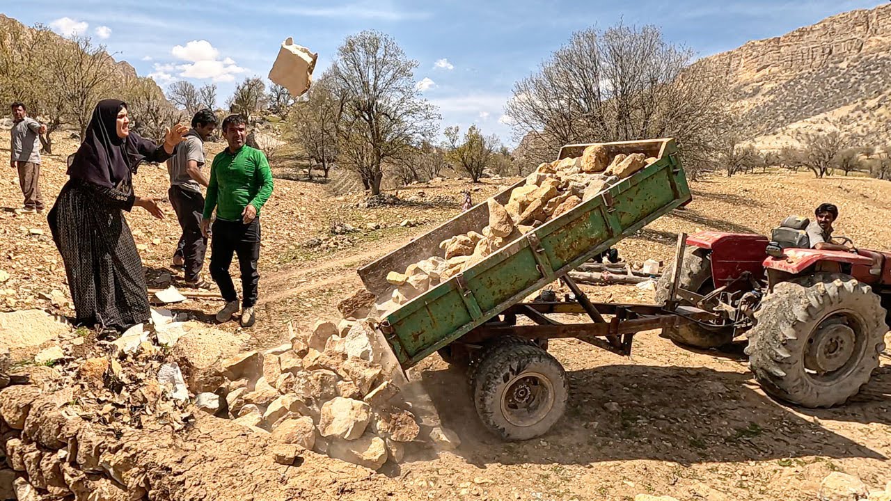 Using tractor to collect Stones for Building a stone Farmhouse - YouTube