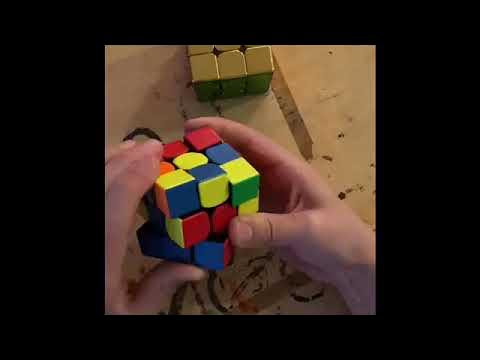 9 Year Old Solves 2 Rubik's Cubes in 1 Minute (Time Lapse) - YouTube