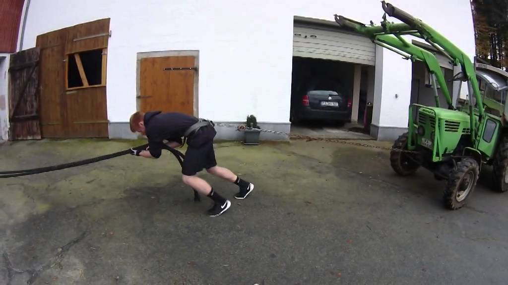 Strongman Tractor Pull by a 17 year old - YouTube