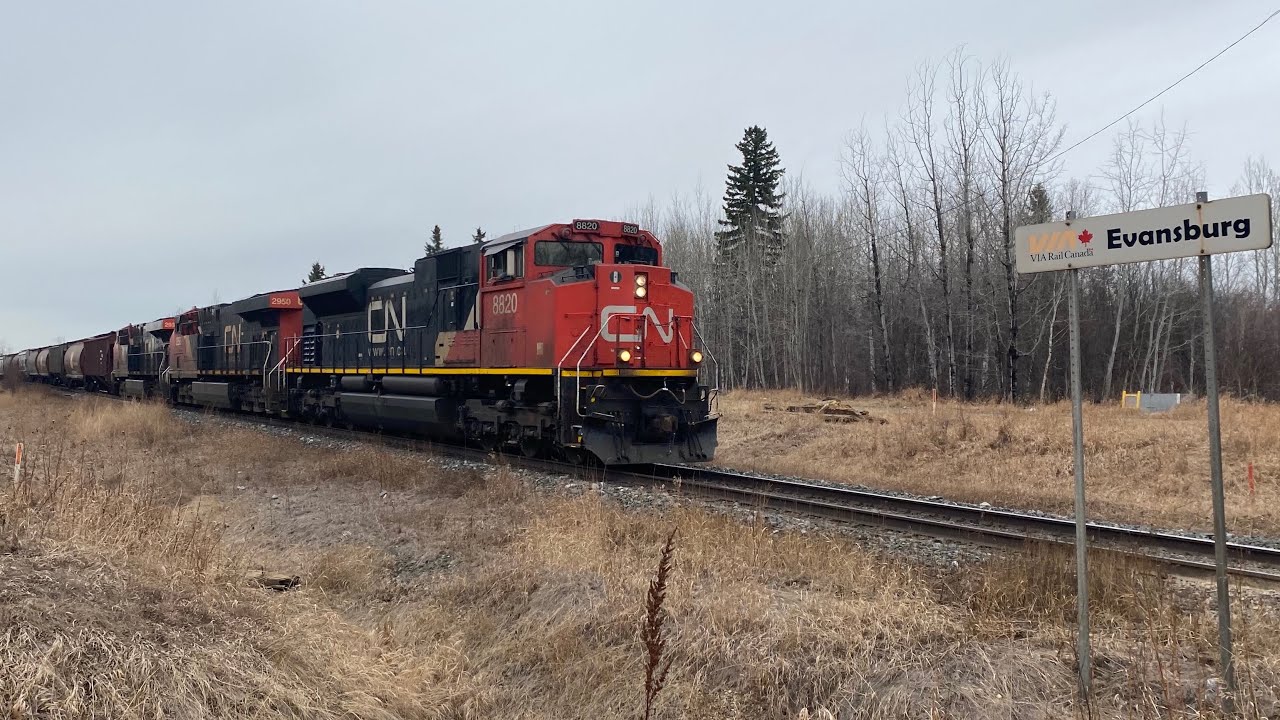 CN 8820 Leads CN G832 (Grain) East at Evansburg AB, CN Edson Subdivision. - YouTube