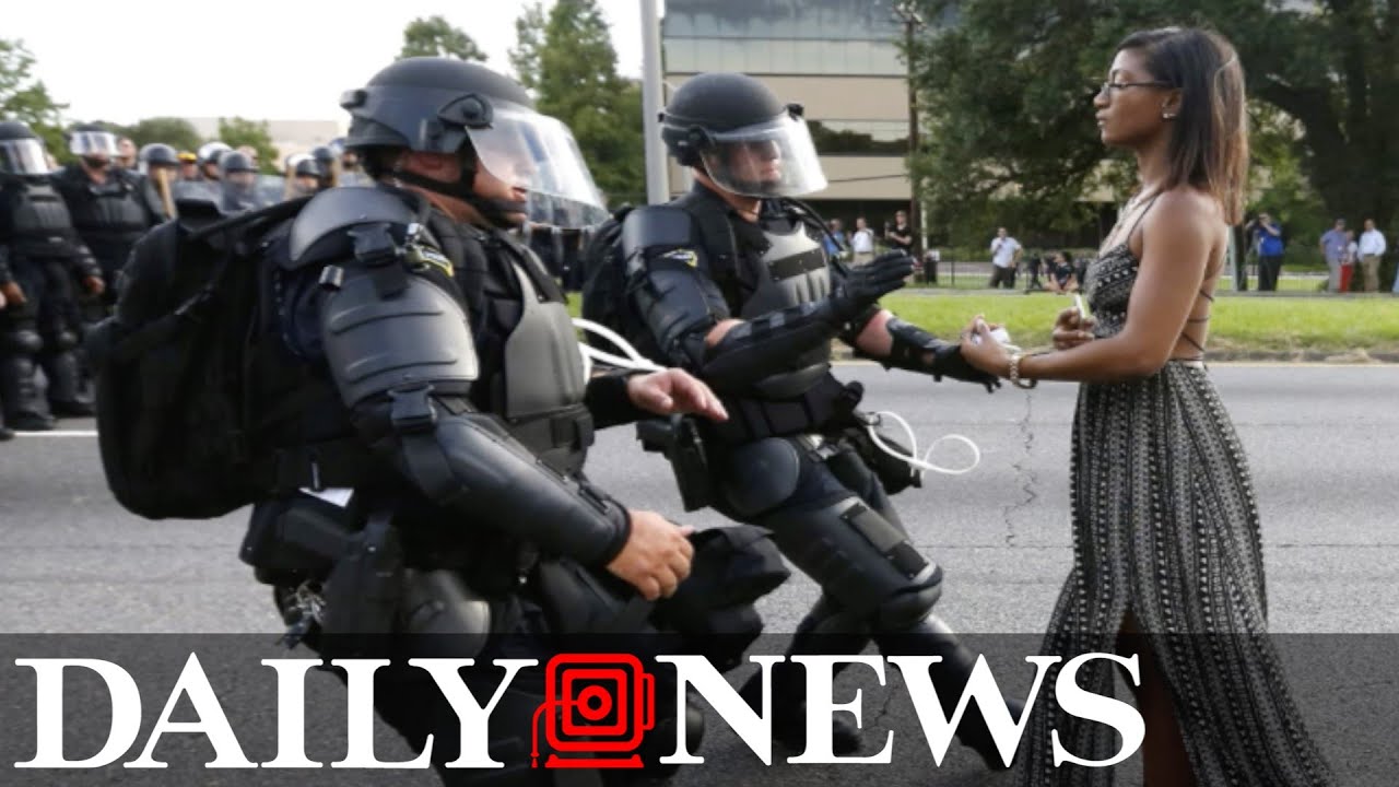 Photo of woman confronting Lousiana police goes viral - YouTube