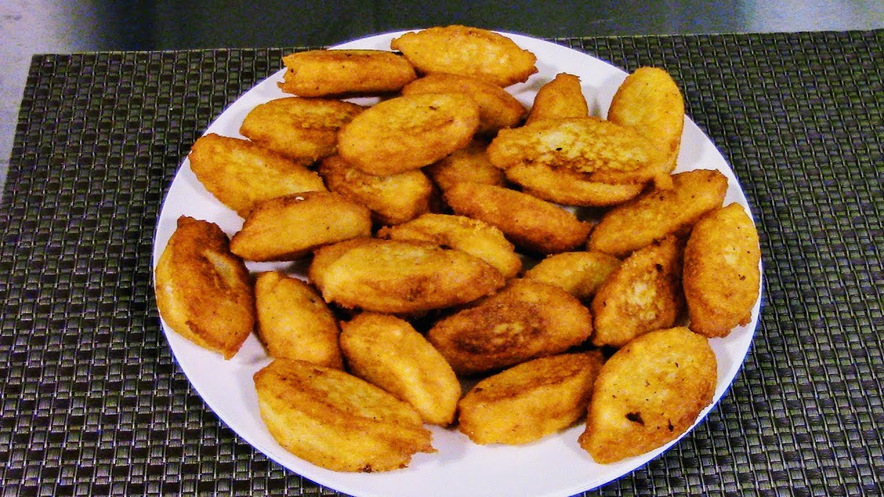 Como hacer arepitas de yuca comida dominicana - YouTube