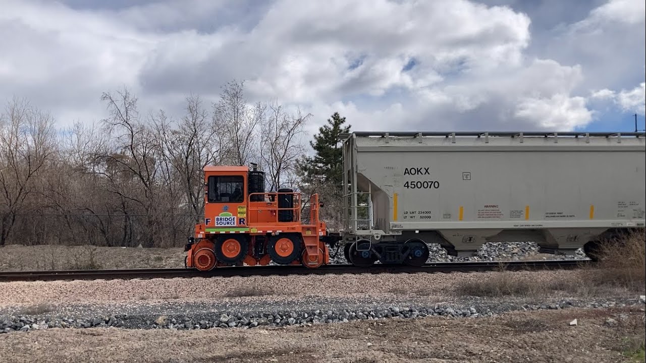 A track mobile rearranges hoppers at a local industry - Ogden, UT. 2/27 ...