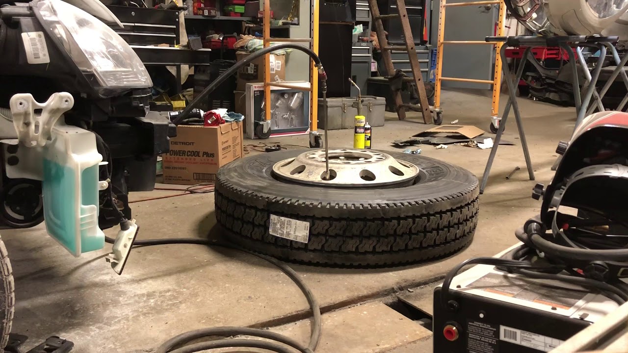 How not to air up a semi truck tire fail diy - YouTube