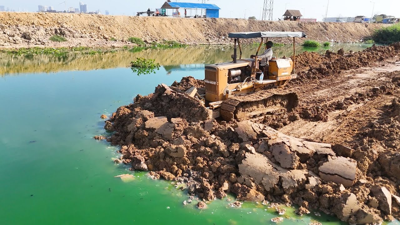 Continue The Wonderful Action Building Land Dike Around Water, Komatsu ...