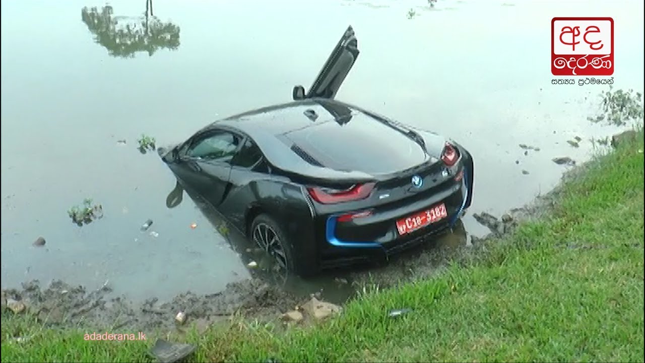 Unregistered super luxury car plunges into Diyawanna Oya - YouTube