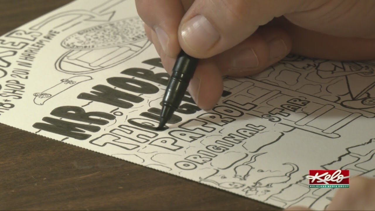Local cartoonist draws up a unique way to share interests - YouTube