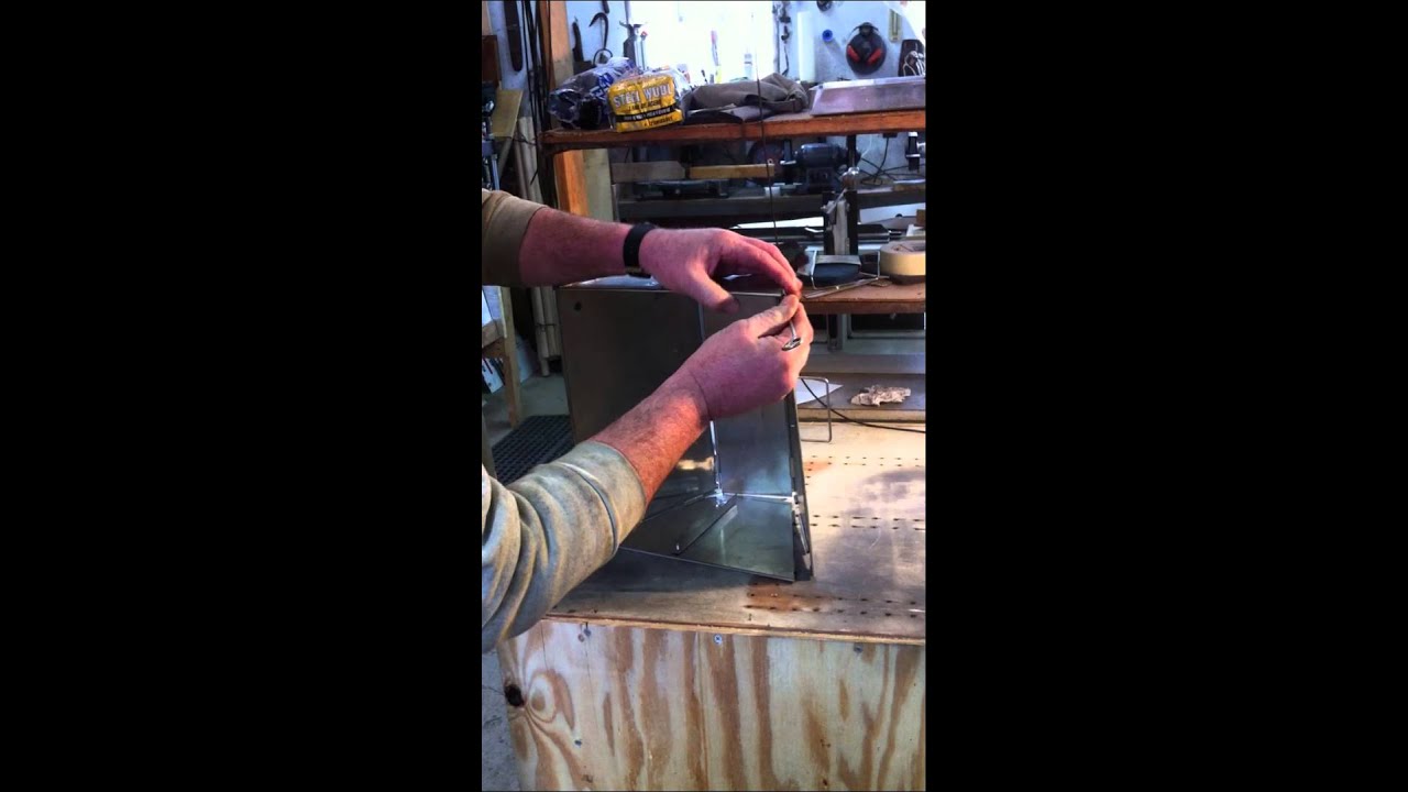 The "Sproul Baker" campfire reflector oven assembly - YouTube