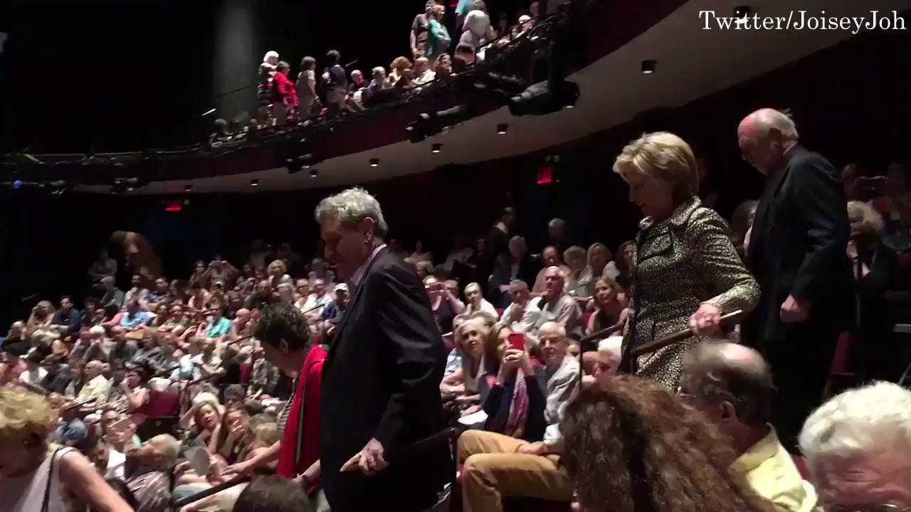 Hillary and Bill Clinton received a standing ovation from the crowd of ...