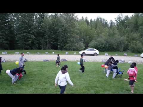 Family ladies vs men balloon pop relay! #epicfamilycamping
