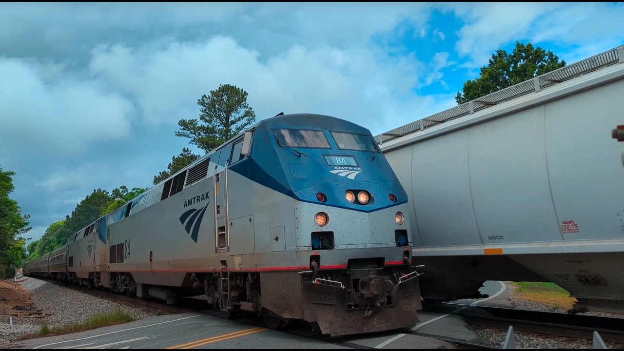 Amtrak's Silver Star overtaking NS freight train with BNSF power in ...