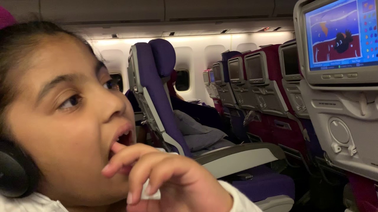 Nepali cute girl laughing in the airplane - YouTube