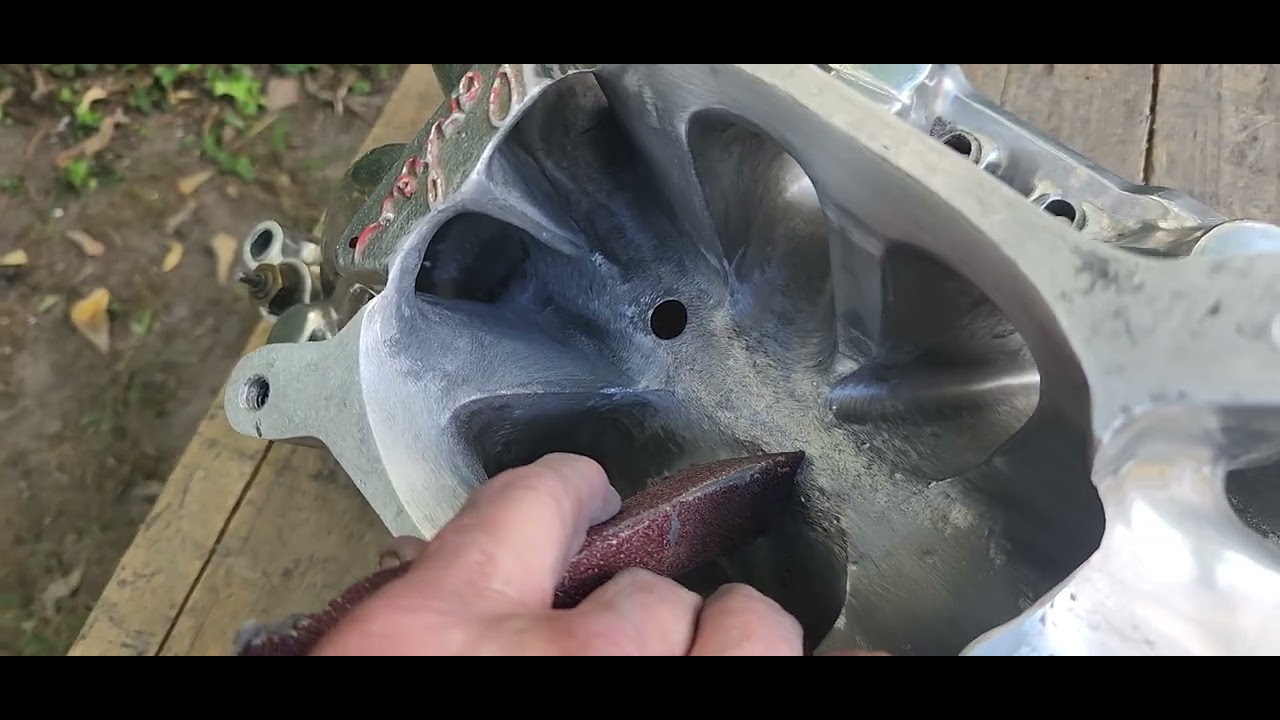 Flat boarding an intake manifold , blending and finding imperfections ...