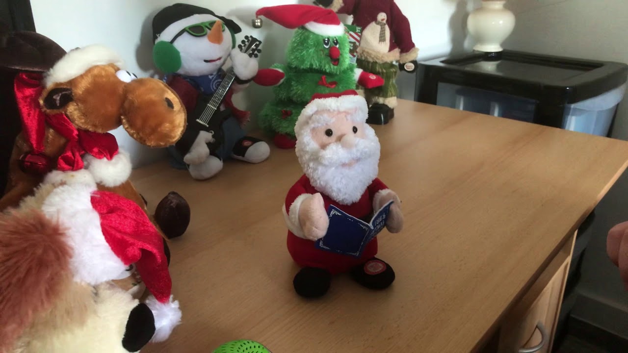 Singing Father Christmas sings we wish you a merry Christmas - YouTube