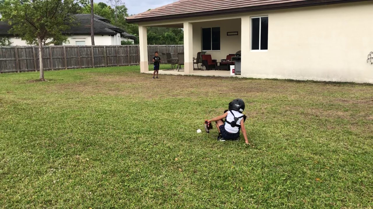 Daniel pitching and Marcos catching - YouTube