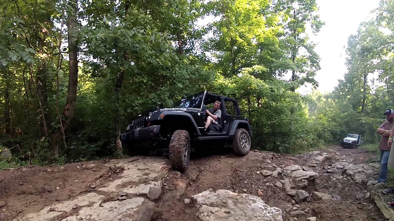Stock Jeep Wrangler Trying To Rock Crawl ... Rubicon Slamming The Rocks ...