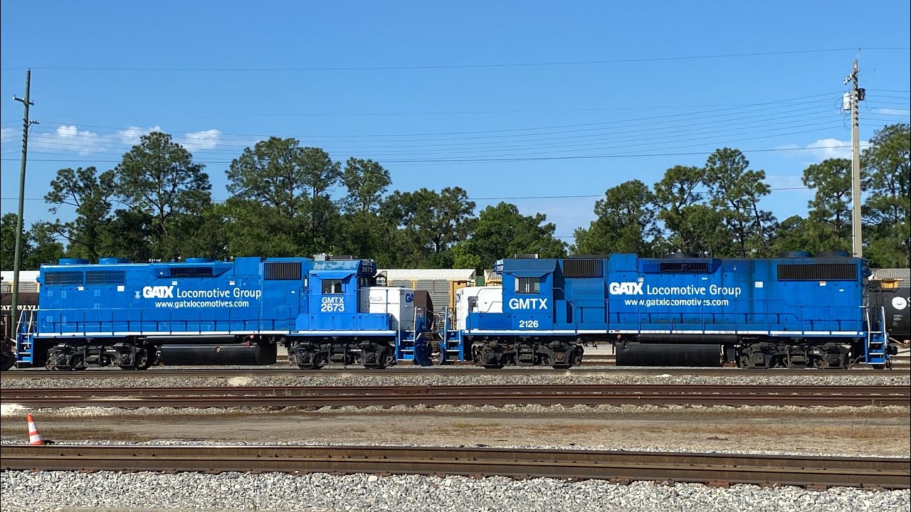 GATX EMD GP38-2 Locomotives at FEC Bowden Yard - YouTube