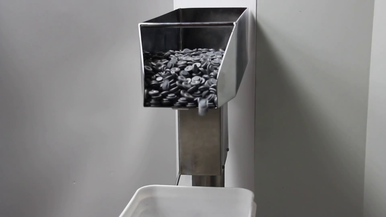 Vibratory Hopper for Stoppers - YouTube