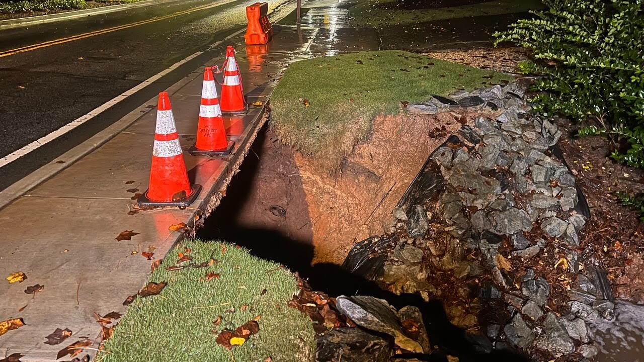 Hurricane Helene: Sinkhole closes road in Sandy Springs area - YouTube