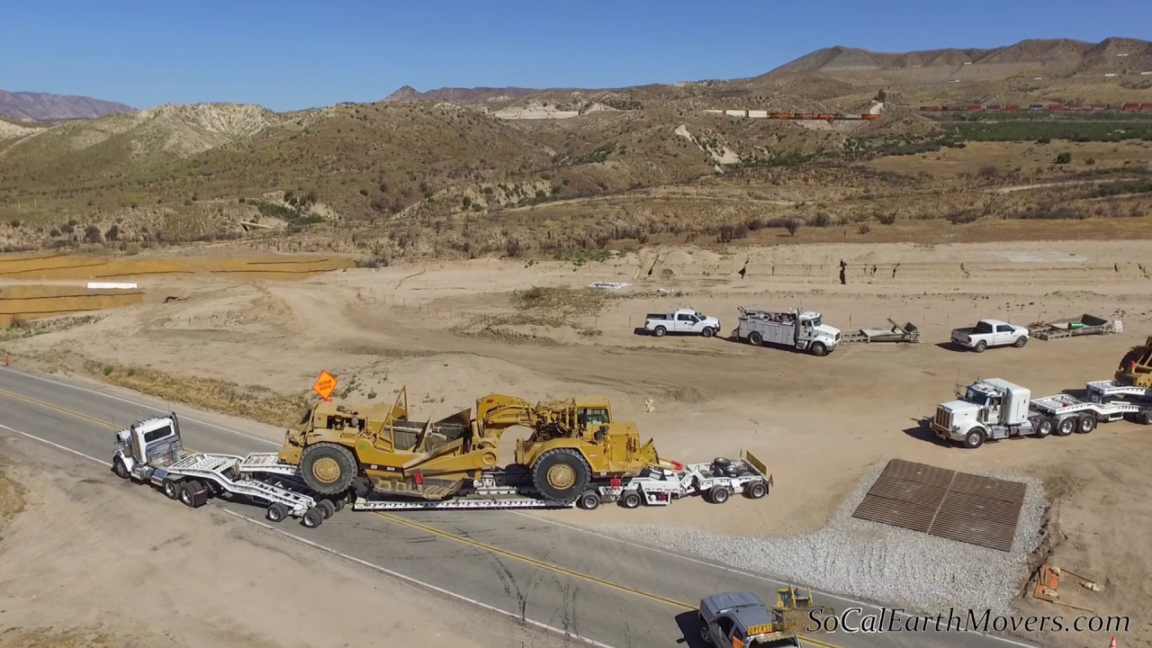 Hauling out 657 scrapers - YouTube