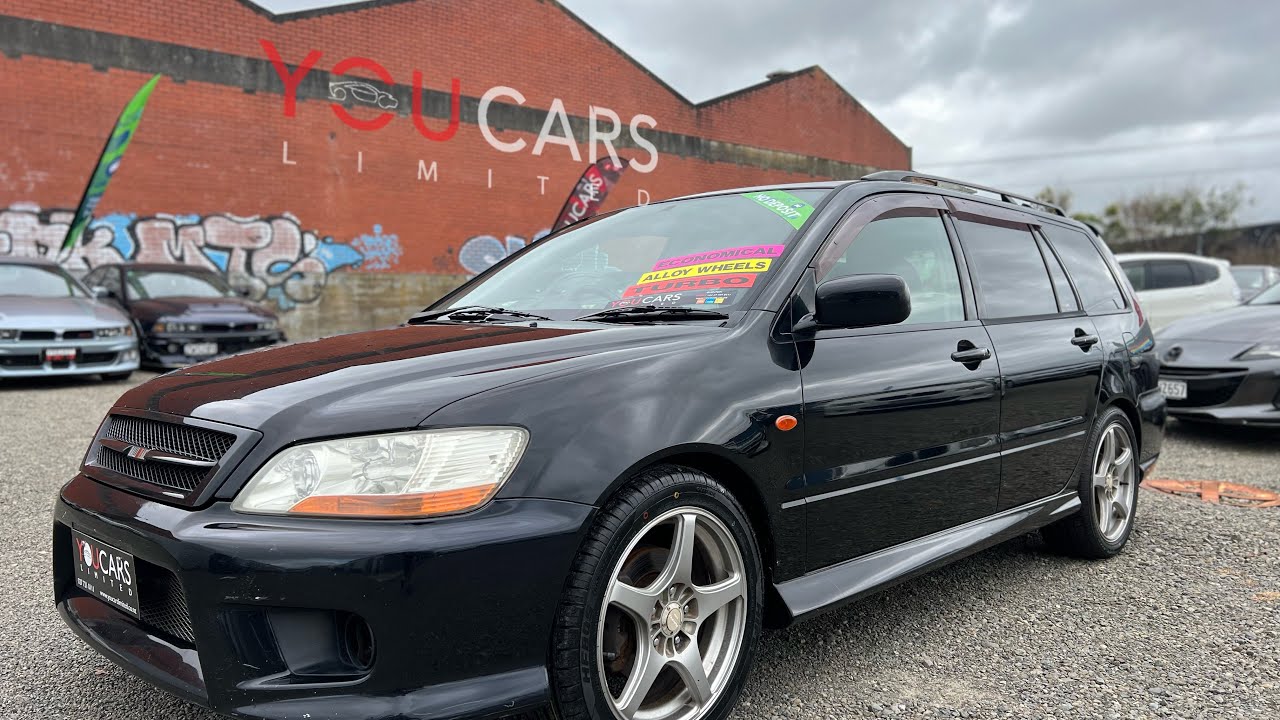 2002 Mitsubishi Lancer Cedia Ralli-Art - YouTube