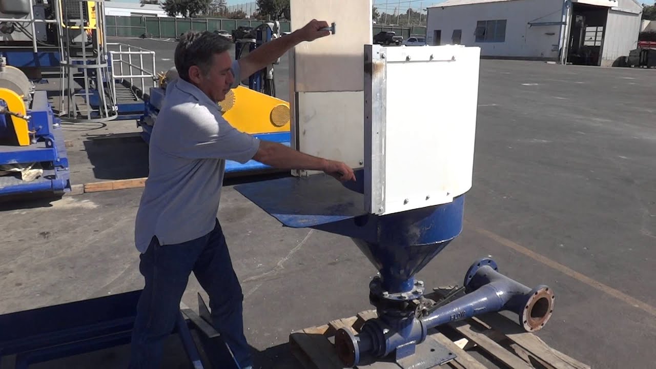 Dust reducing cover for hoppers - YouTube