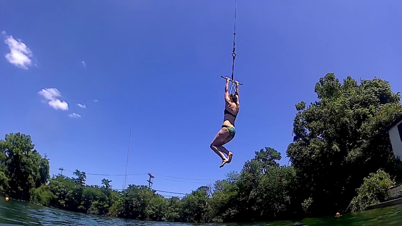 girl rope swing into lake - YouTube