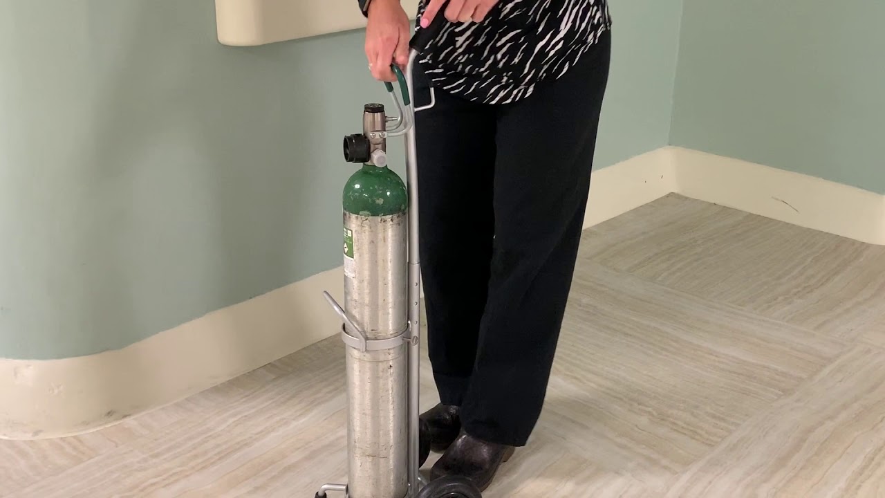 Securing oxygen cylinder into cart - YouTube