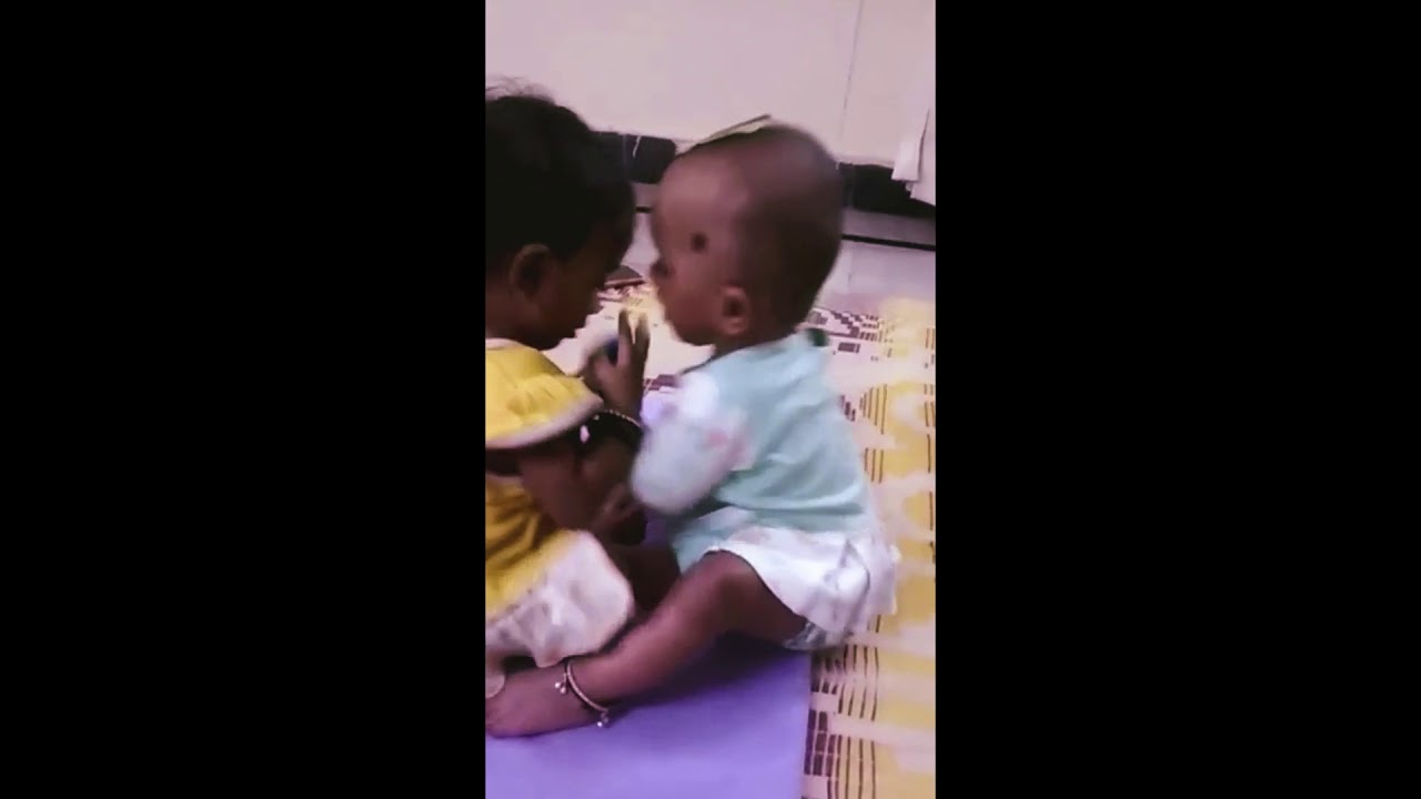 Twin baby girls fight over pacifier - YouTube
